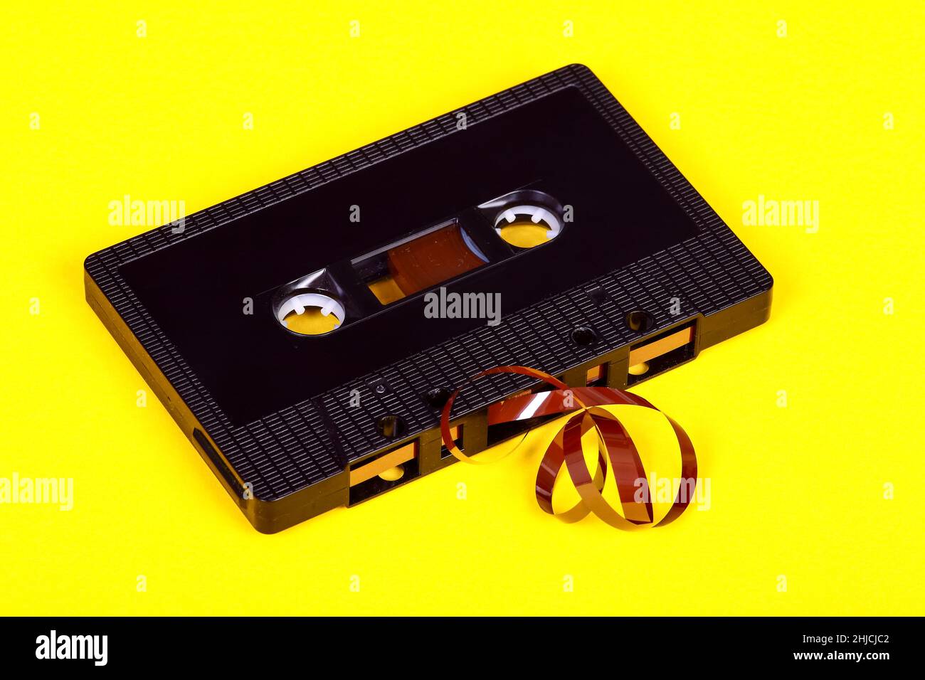 Old vintage retro audio cassette tape after a tape jam where the ...