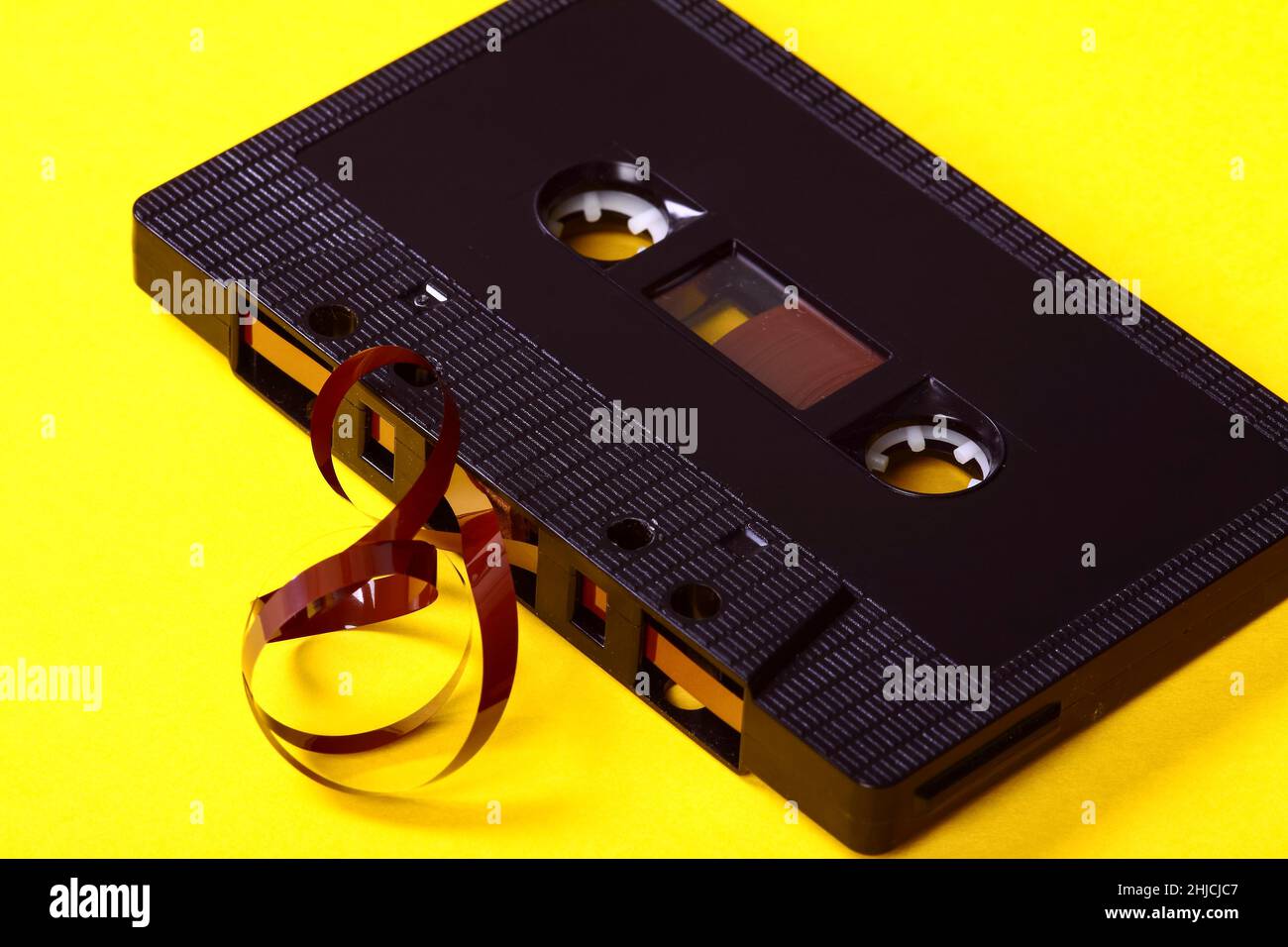 Old vintage retro audio cassette tape after a tape jam where the ...