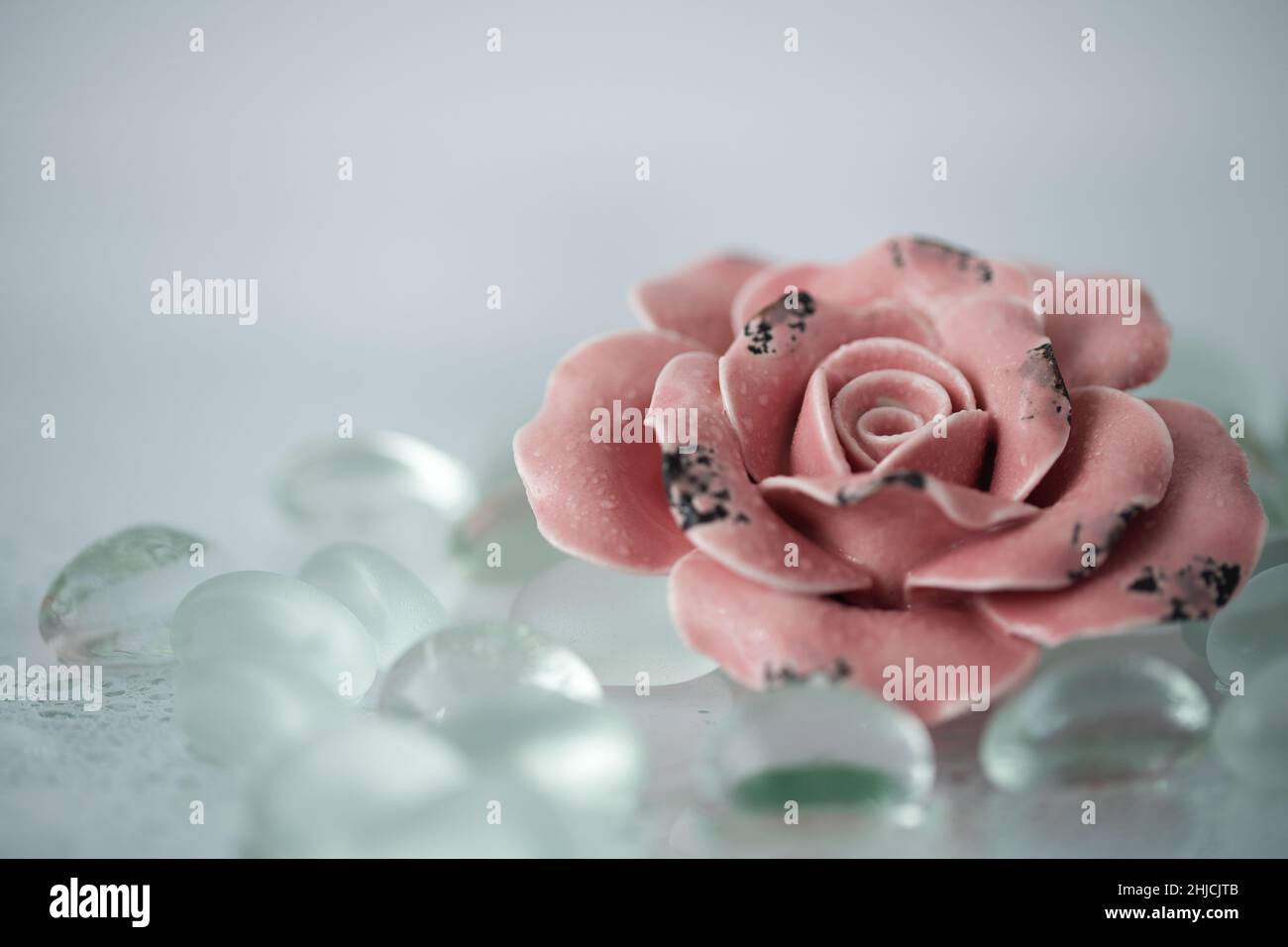Pink Ceramic Rose with Transparent Stones Stock Photo - Alamy
