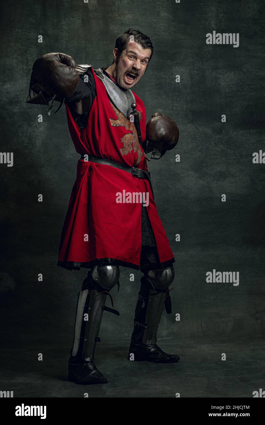 Portrait of medieval warrior or knight with dirty wounded face in ...