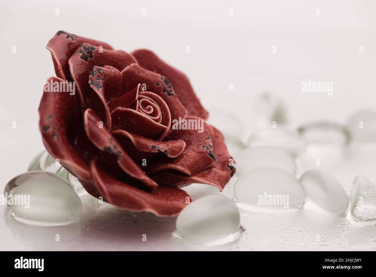 Red Ceramic Rose with Transparent Stones Stock Photo - Alamy