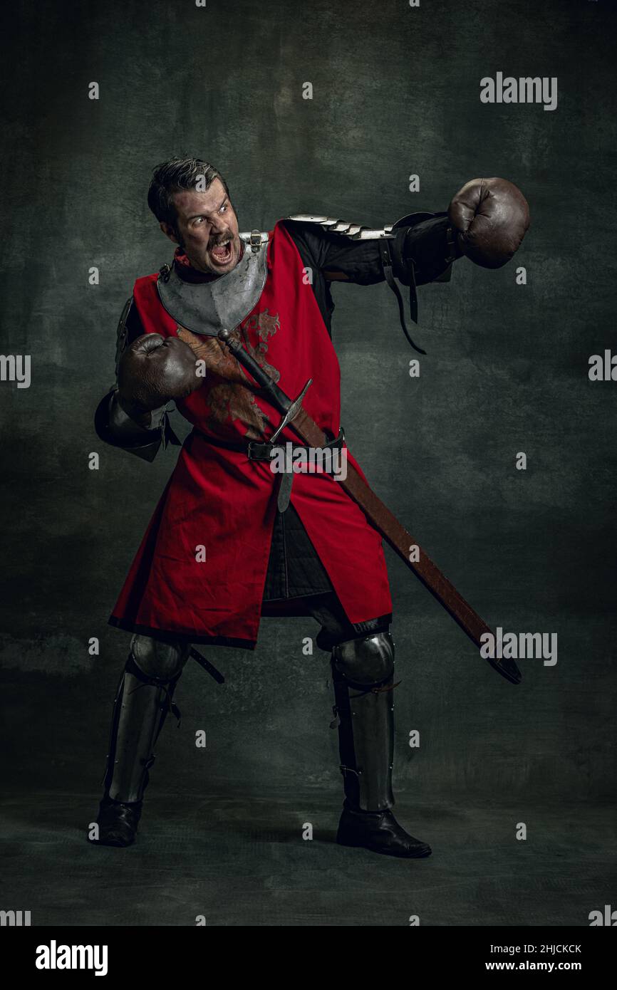 Portrait of medieval warrior or knight with dirty wounded face in ...