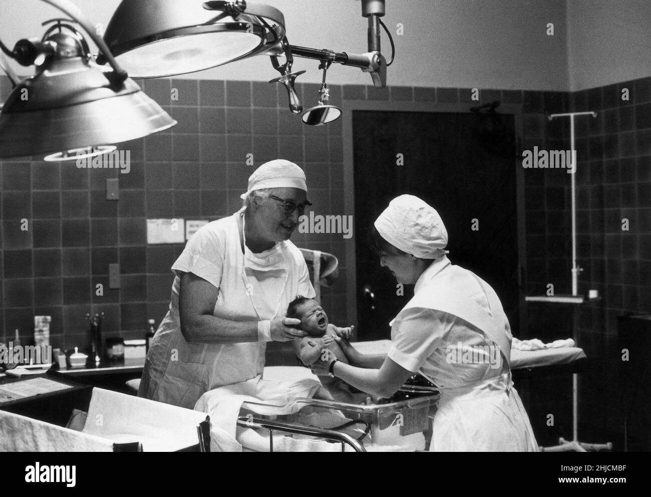 Dr apgar with nurse and infant hi-res stock photography and images - Alamy