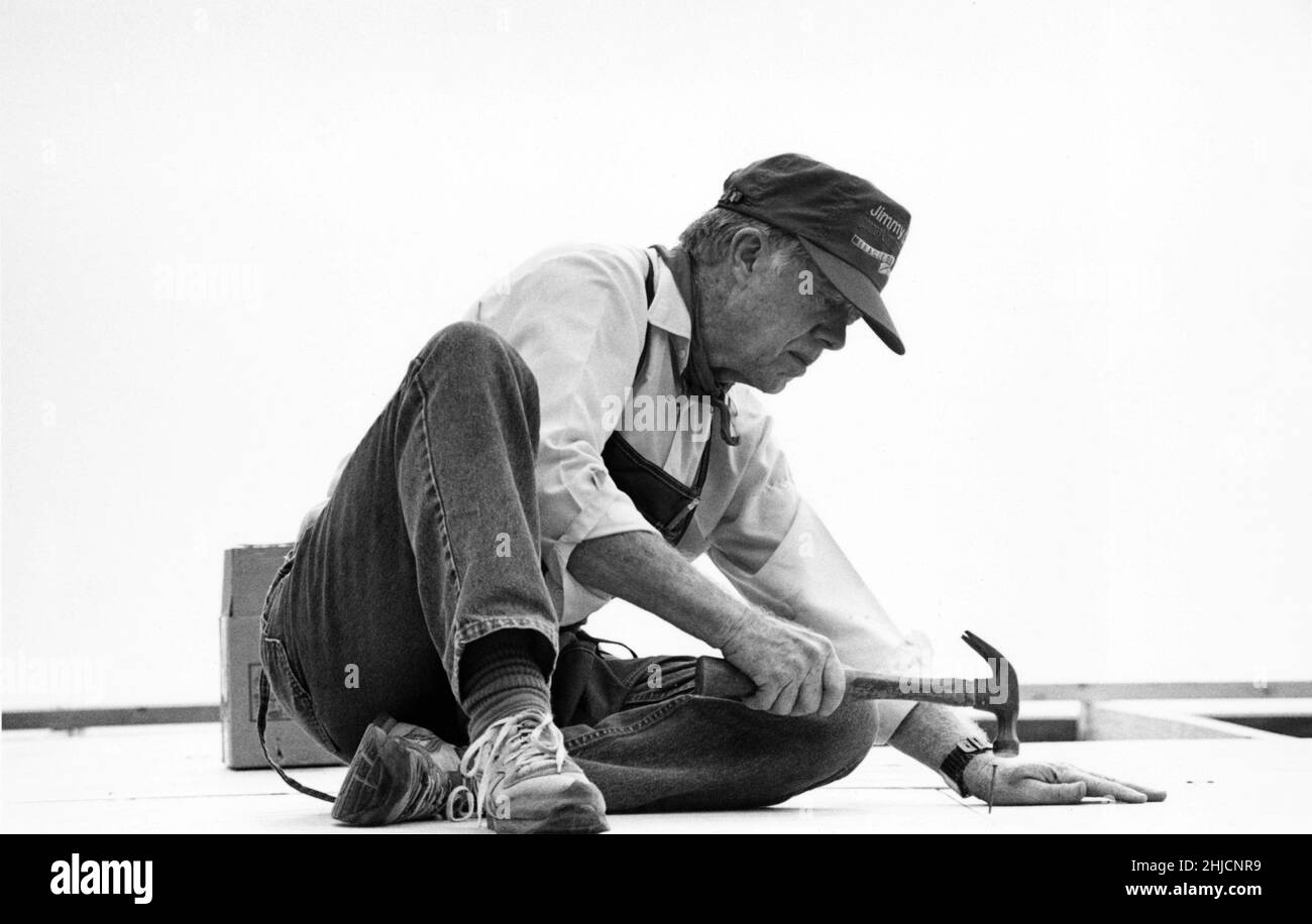 Former President, Jimmy Carter, of Habitat for Humanity building a ...