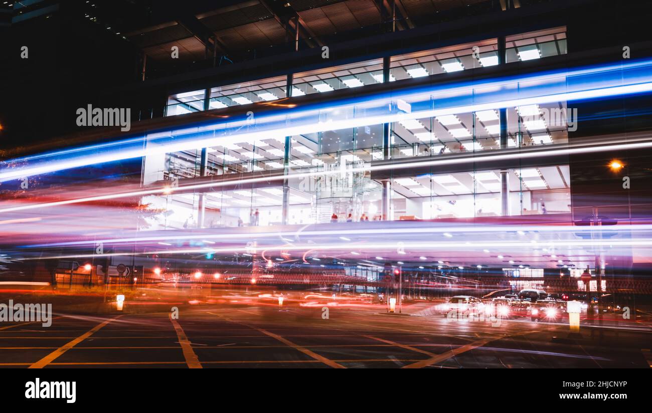 Modern building with glowing lights Stock Photo - Alamy