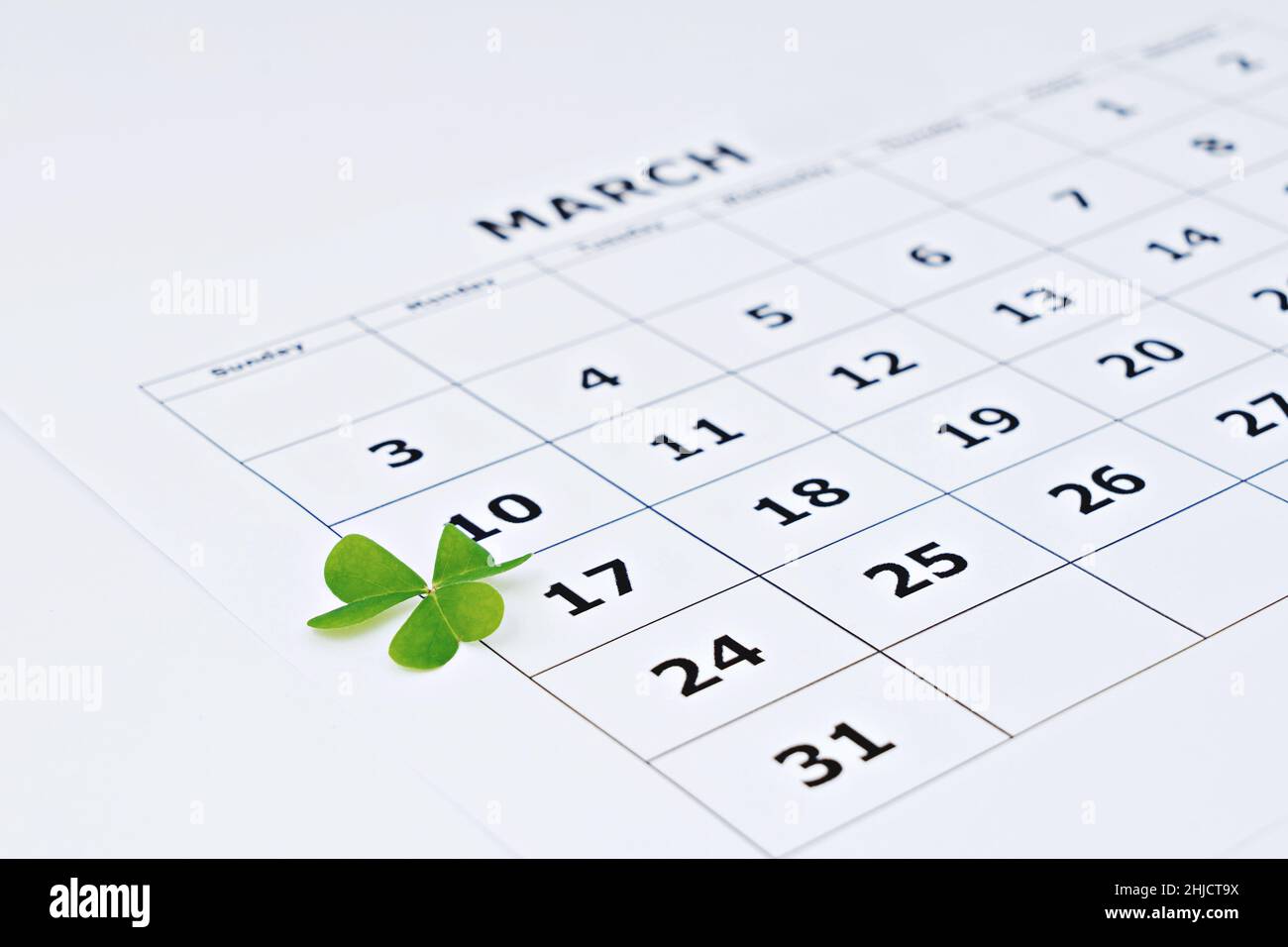 Closeup view of paper calendar sheet with selected date March 17 Stock ...