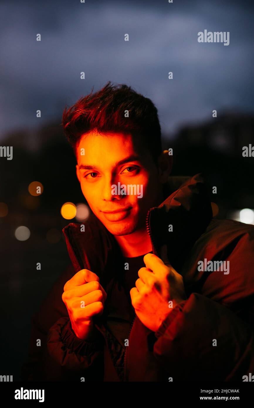 Man under street light hi-res stock photography and images - Alamy