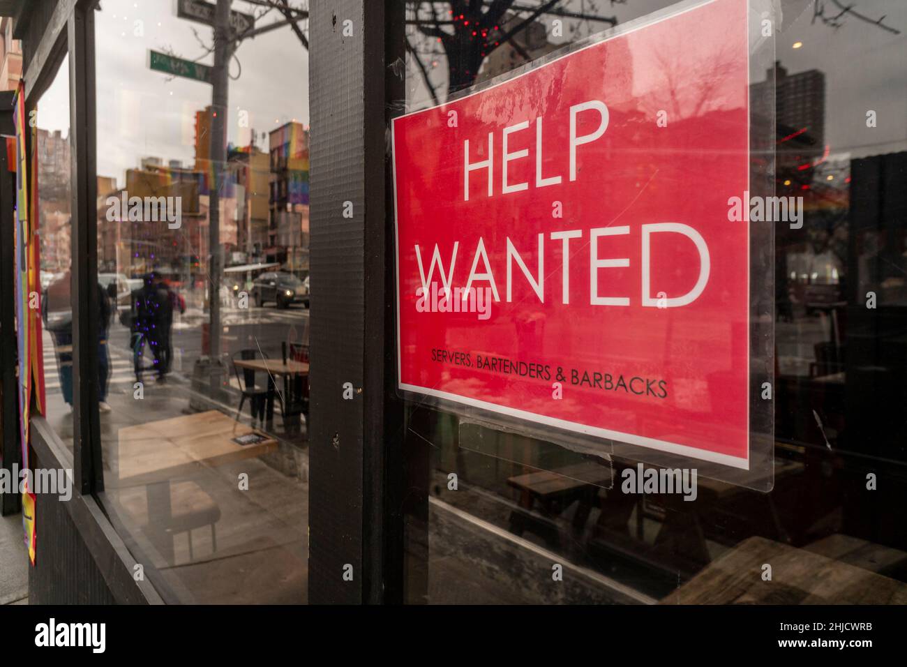 Help wanted sign in a restaurant window in HellÕs Kitchen in New York ...