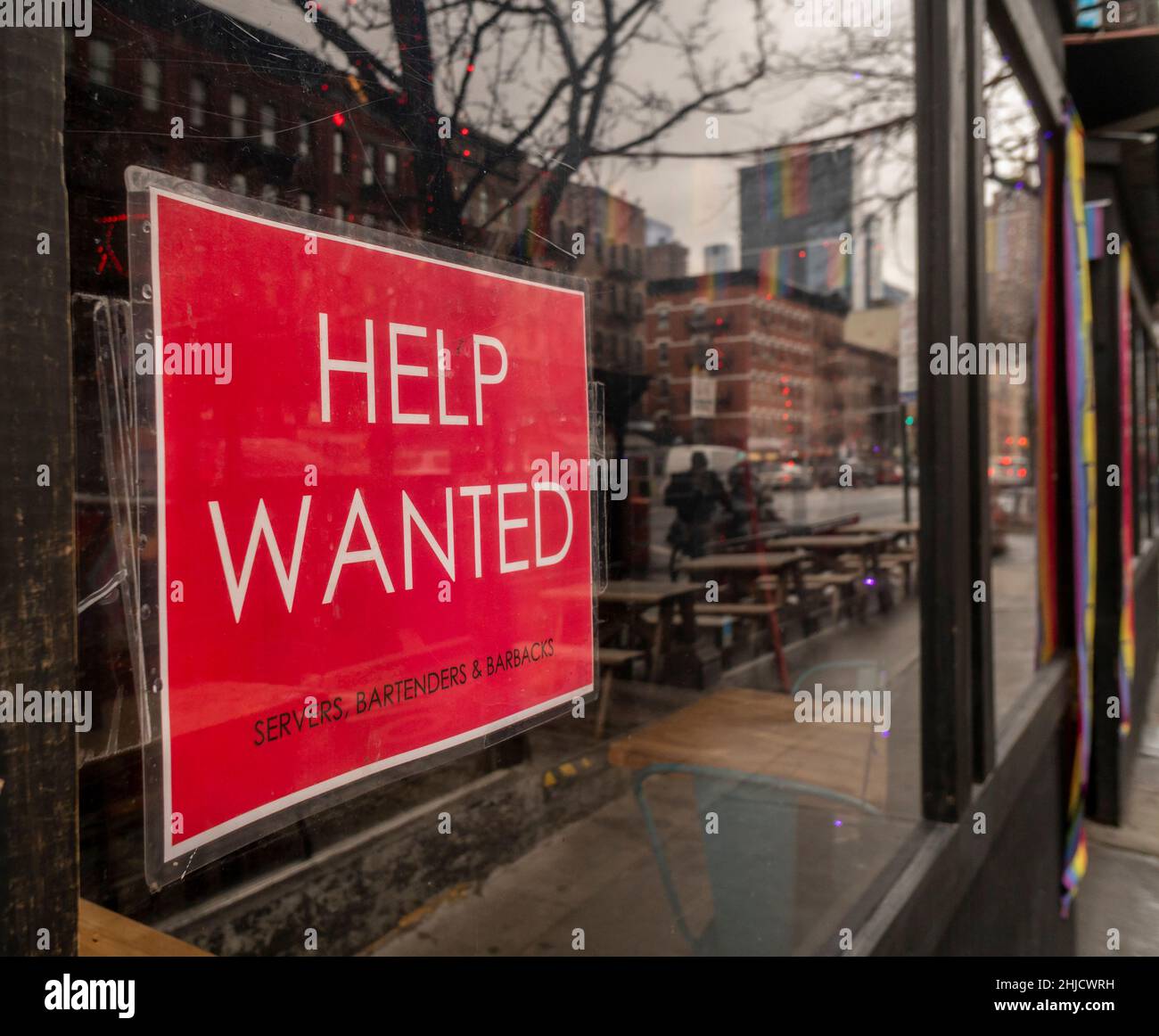 Help wanted sign in a restaurant window in HellÕs Kitchen in New York ...