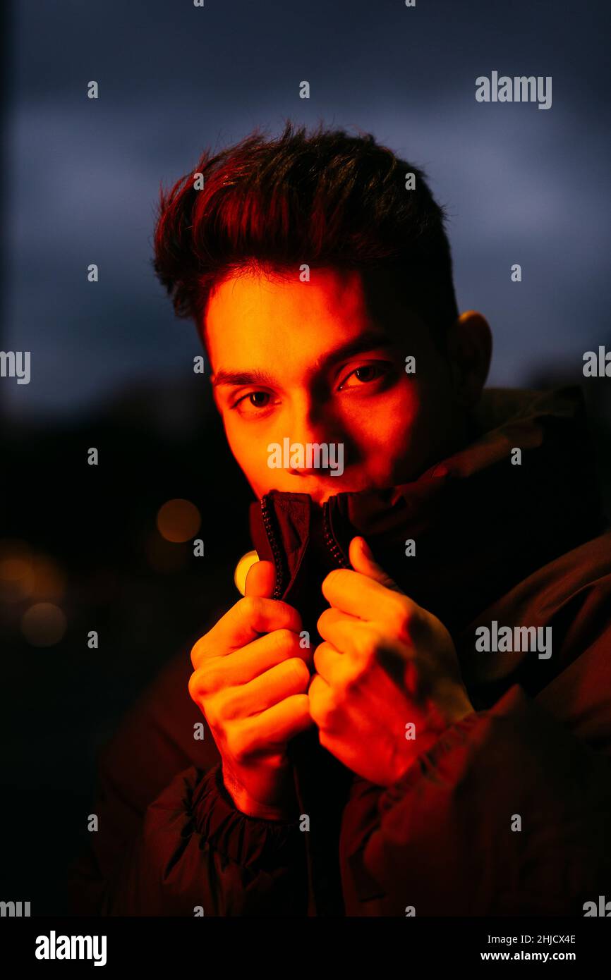 Man under street light hi-res stock photography and images - Alamy