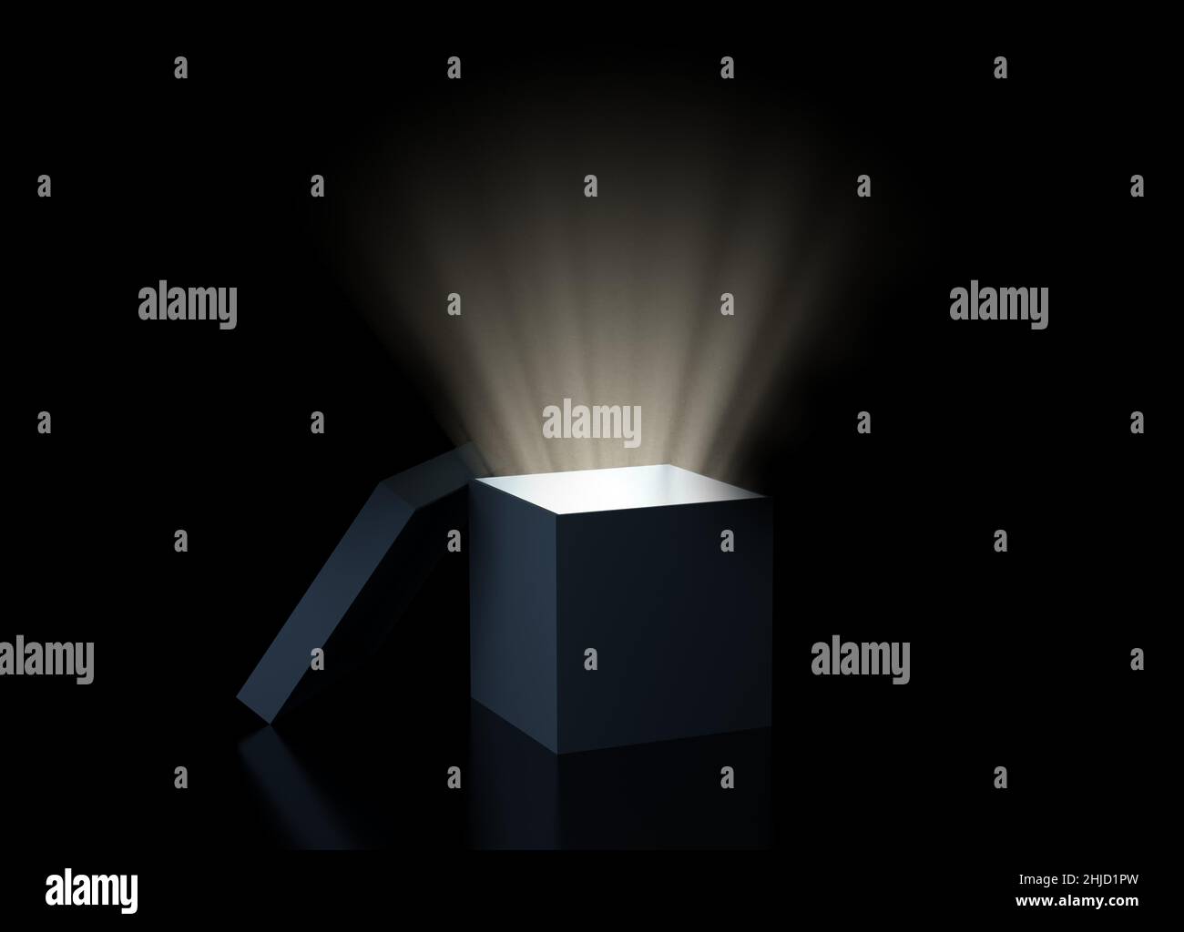 Magic box with glowing light over black background, exploration, idea ...