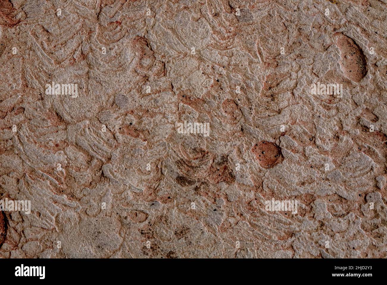 textured stone, beige and orange, rust coloured lines Stock Photo - Alamy