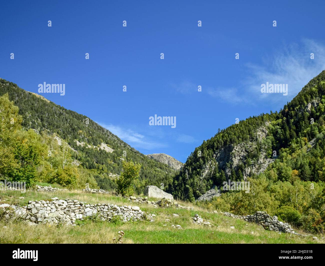 beautiful mountain valley landscape, white stone courtyard fragments ...