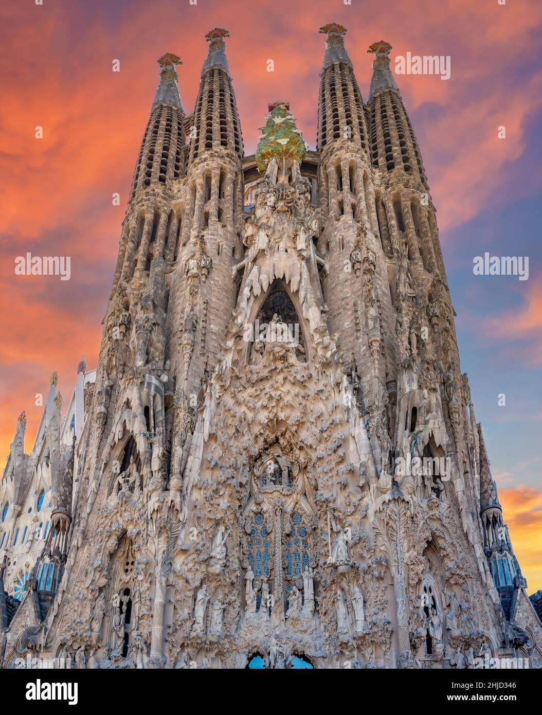 Facade of unfinished sacred family at sunset, "La Sagrada Familia ...