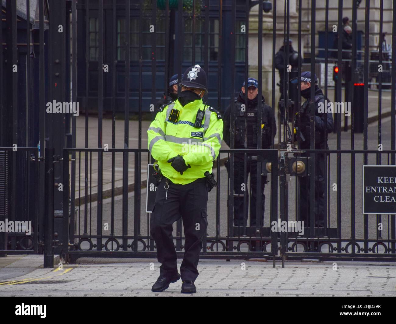 A Metropolitan Police officer outside the Downing Street gates. London ...