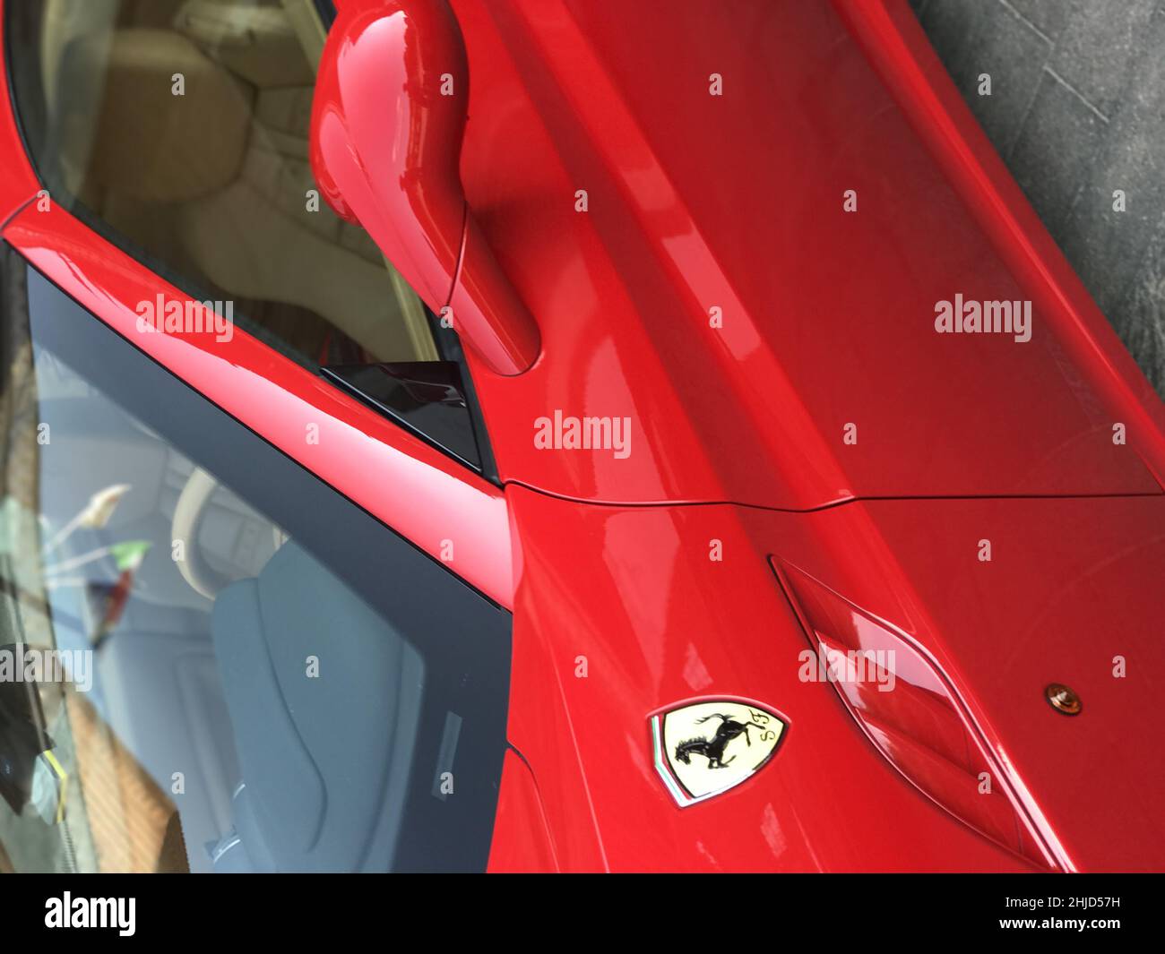 Details of a red Ferrari luxury Italian sports car Stock Photo - Alamy