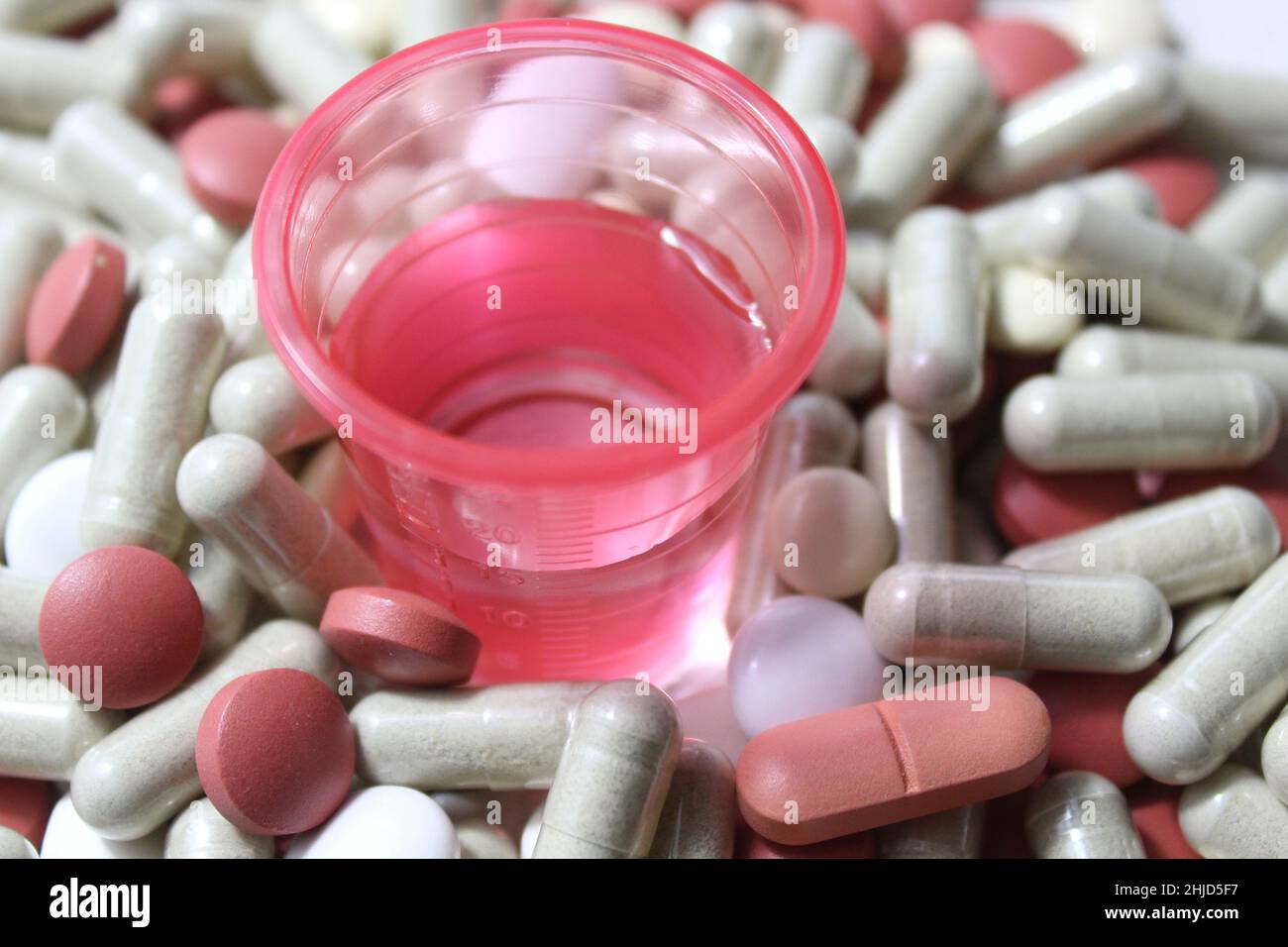 many healthy pills and capsules Stock Photo - Alamy