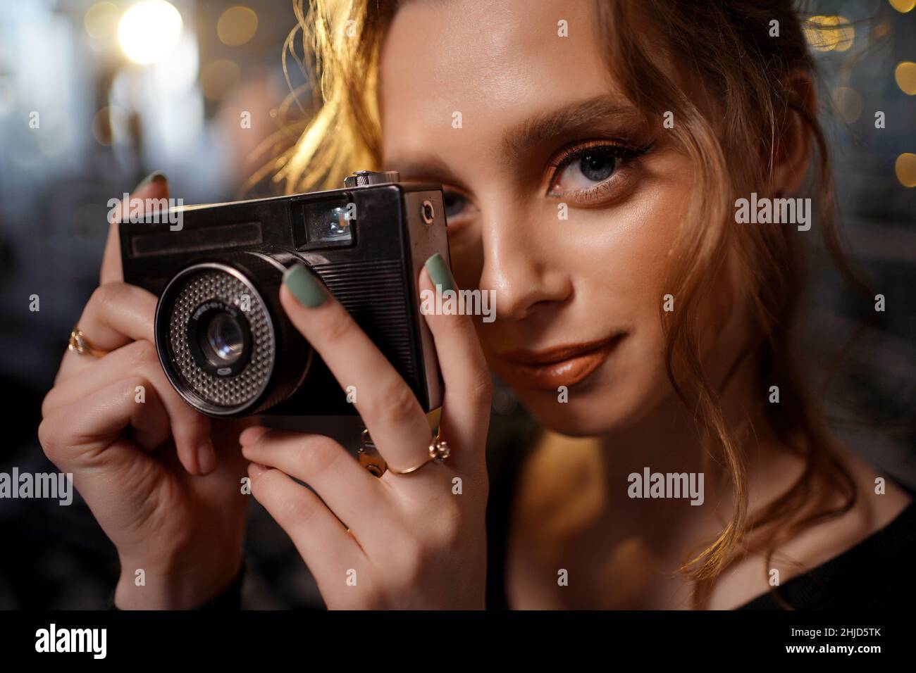 girl with retro photo camera Stock Photo - Alamy