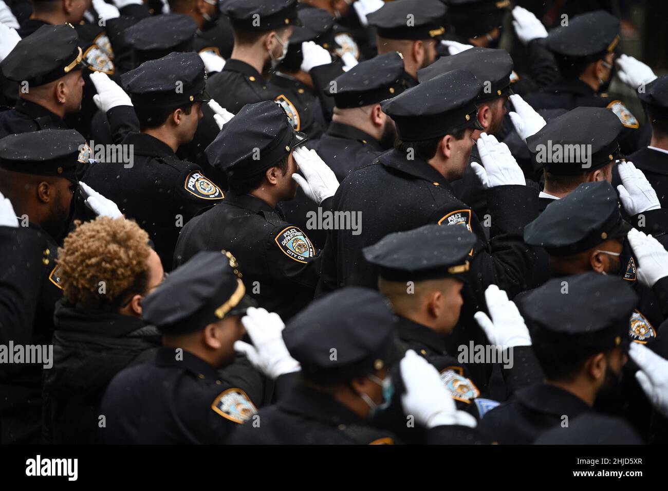 Police salute during funeral services hi-res stock photography and ...