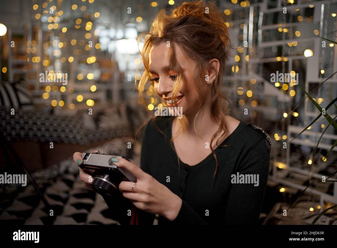 girl with retro photo camera Stock Photo - Alamy
