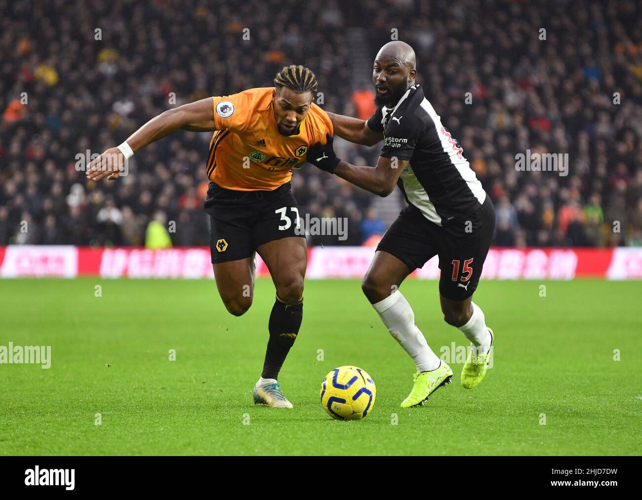 Wolves footballer Adama Traore and Jetro Willems of Newcastle ...