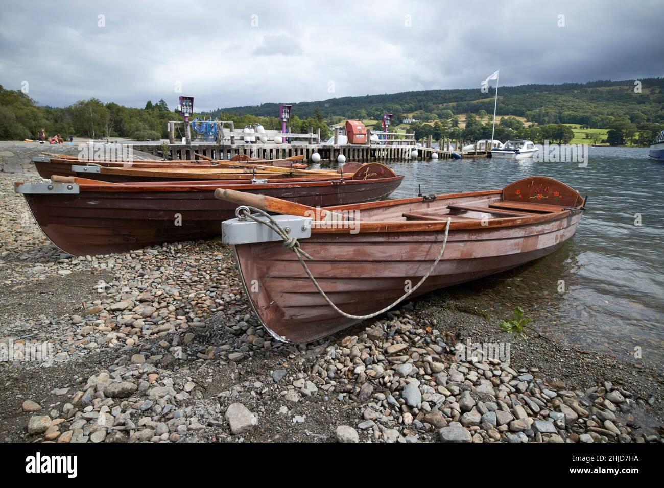 wooden rowing boats for hire on the beach at coniston water coniston ...