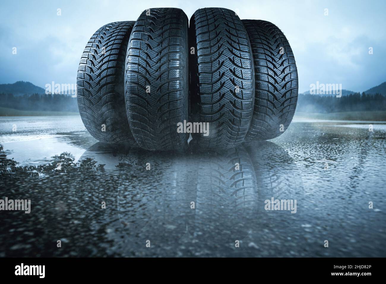 Car tires on the road Stock Photo - Alamy