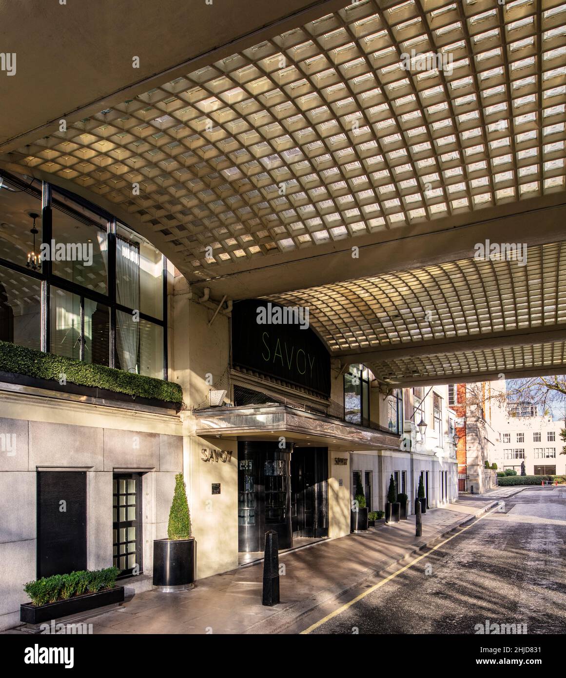 Rear entrance to the Savoy, a luxury hotel in London; designed by ...