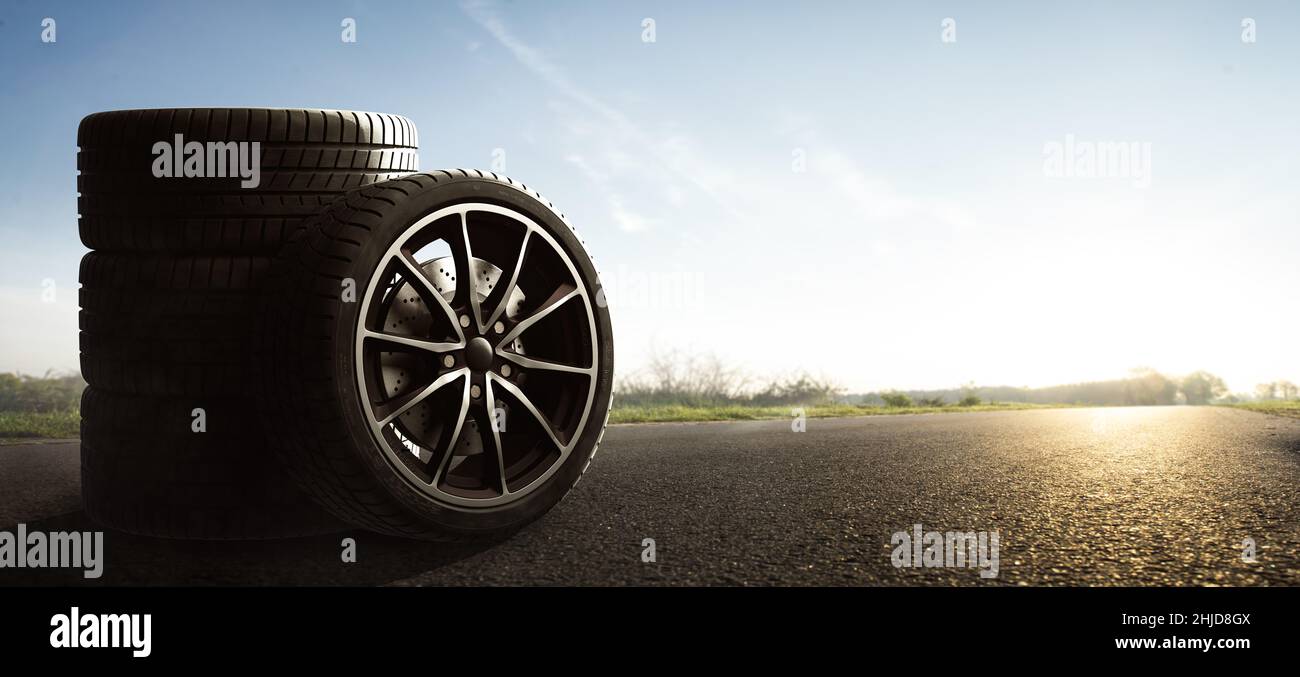 Car tires on the road Stock Photo - Alamy