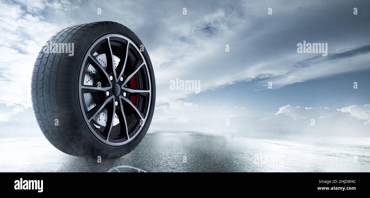 Car tires on the road Stock Photo - Alamy