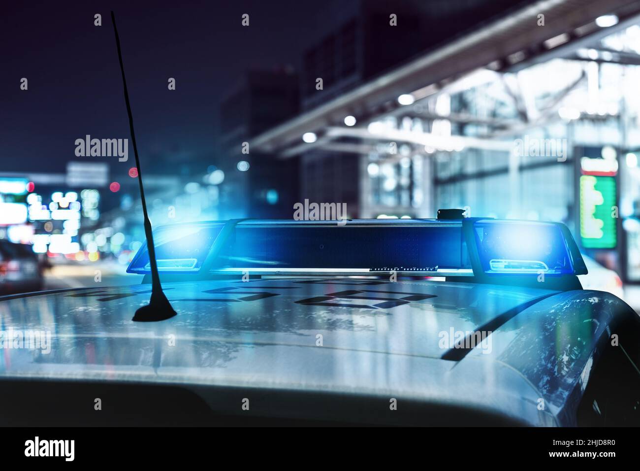 police on duty with blue lights Stock Photo - Alamy