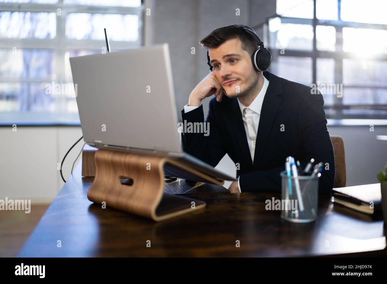 Bored Employee In Video Conference Training Meeting Stock Photo - Alamy