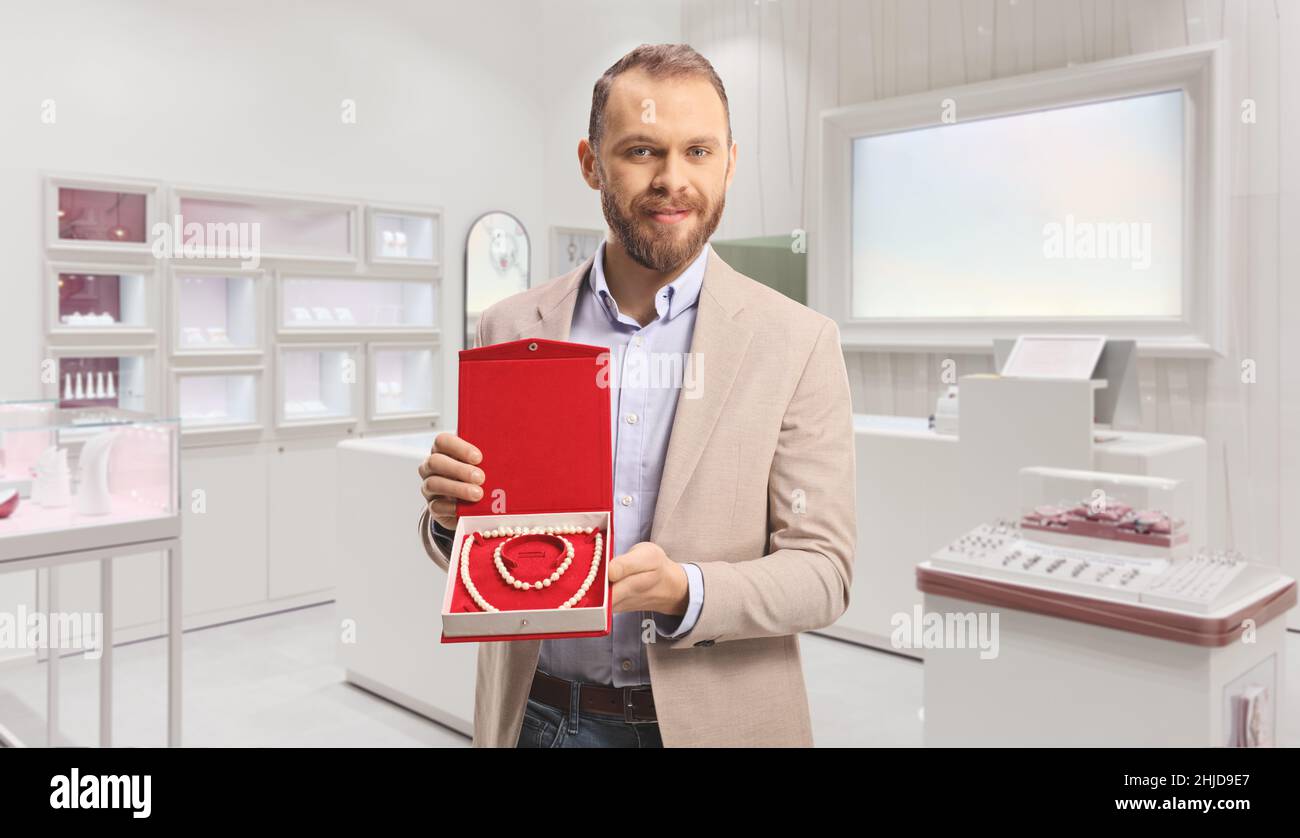 Jewellery store salesman hi-res stock photography and images - Alamy