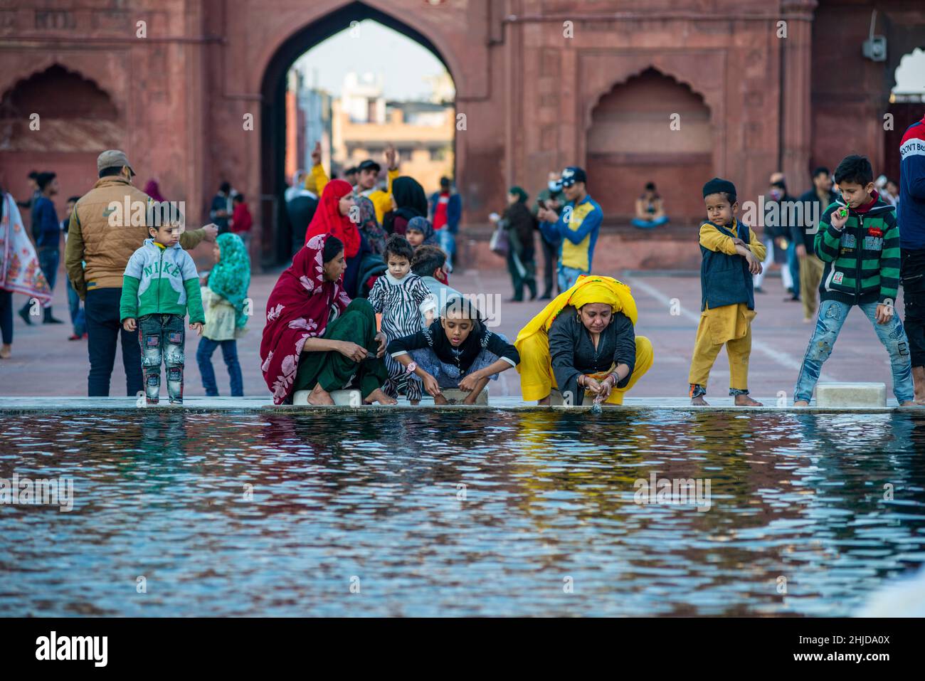 Women seen performing ablution before offering prayers at the Jama ...