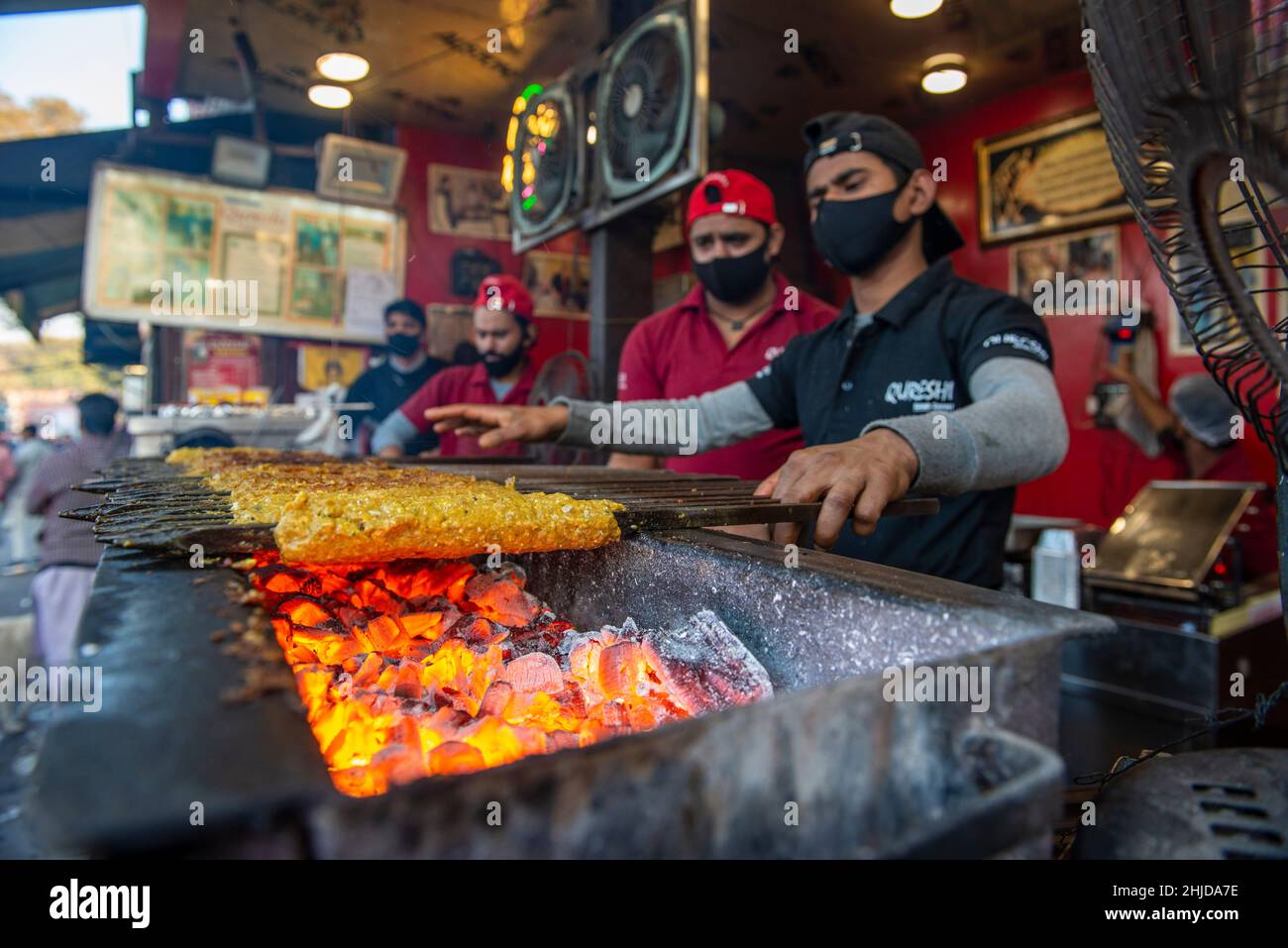 A man seen making Seekh Kebab at Qureshi Kabab Corner, Jama Masjid ...