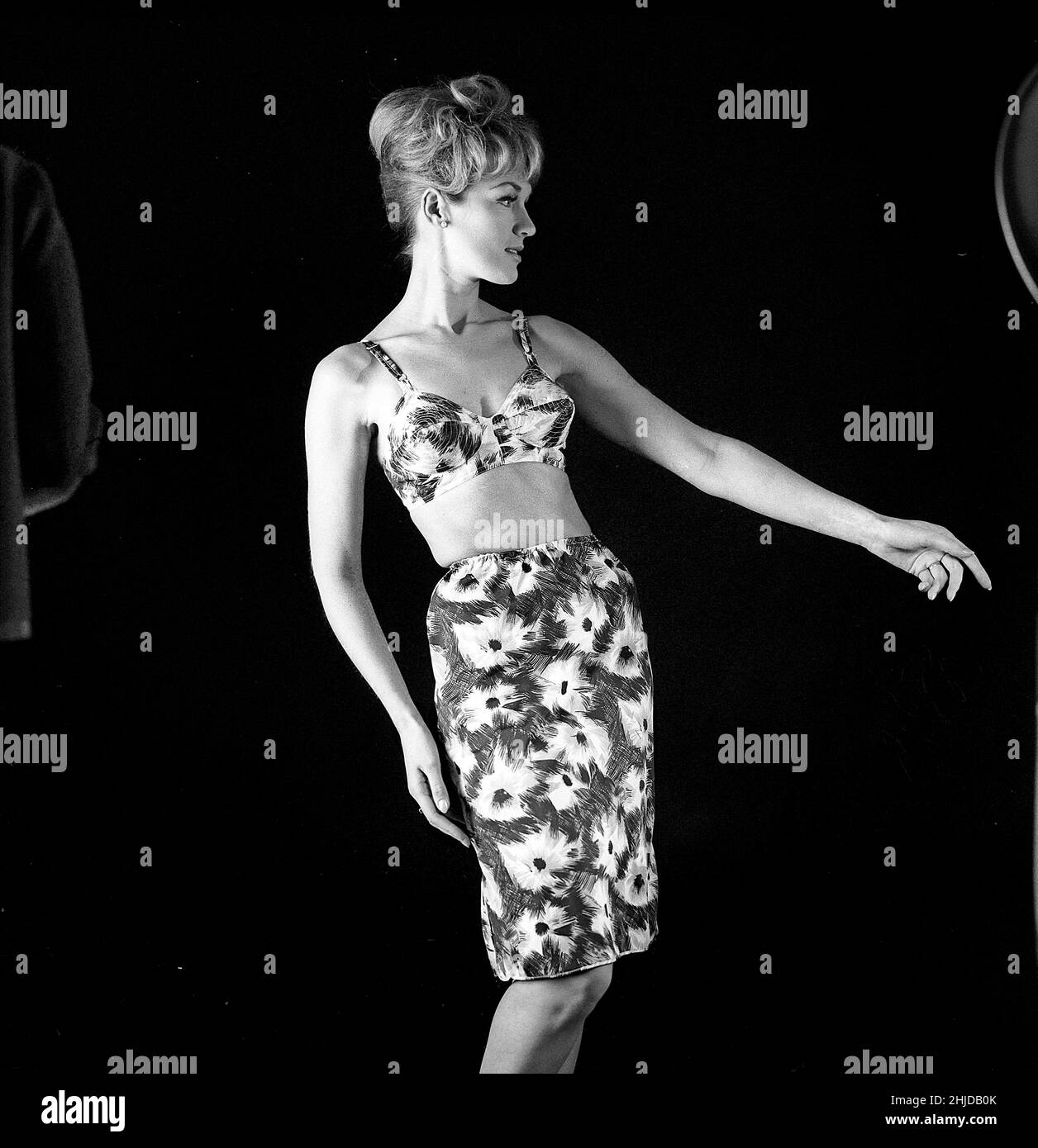 In the 1960s. A model in a typical 1960s outfit photographed in a ...