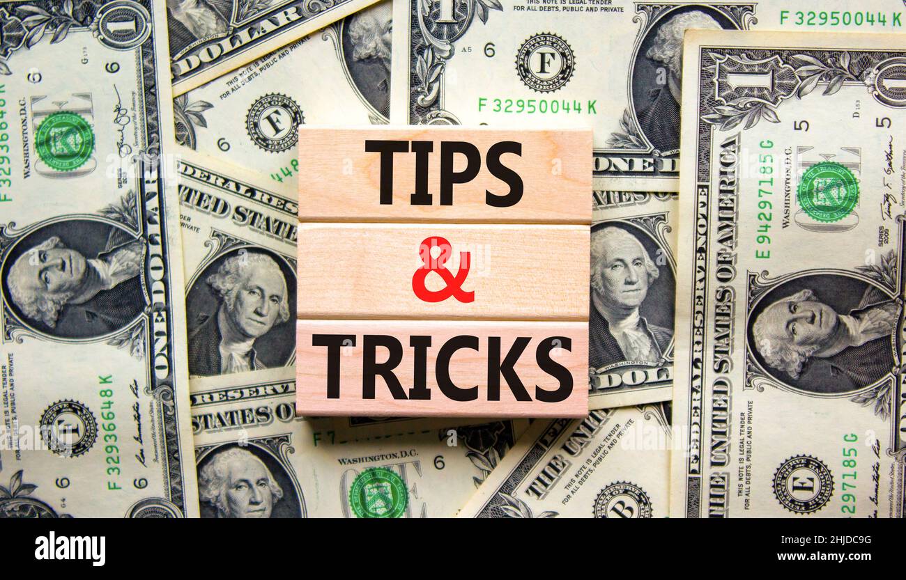 Tips and tricks symbol. Concept words Tips and tricks on wooden blocks ...