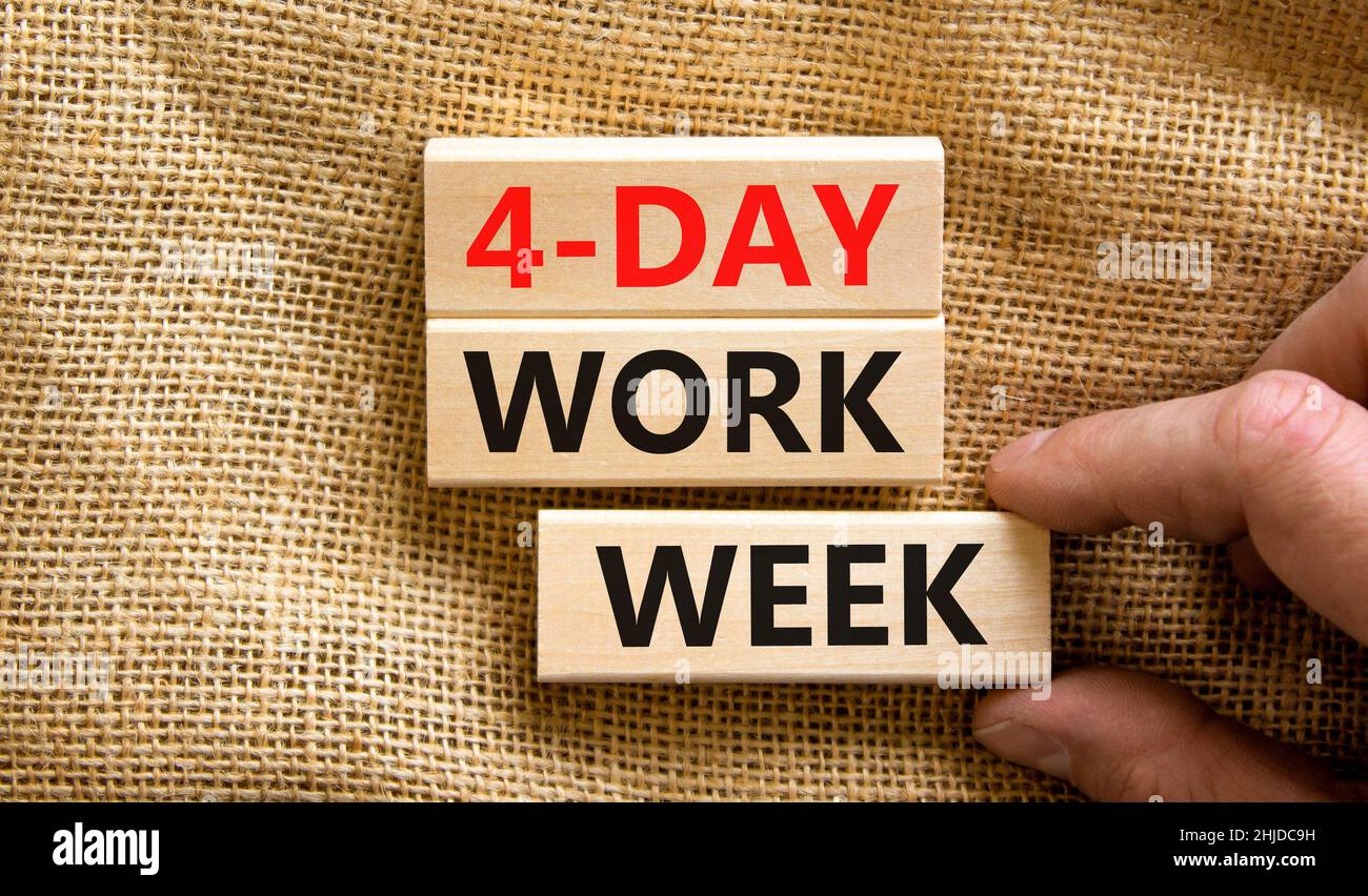 4-day work week symbol. Concept words 4-day work week on wooden blocks ...