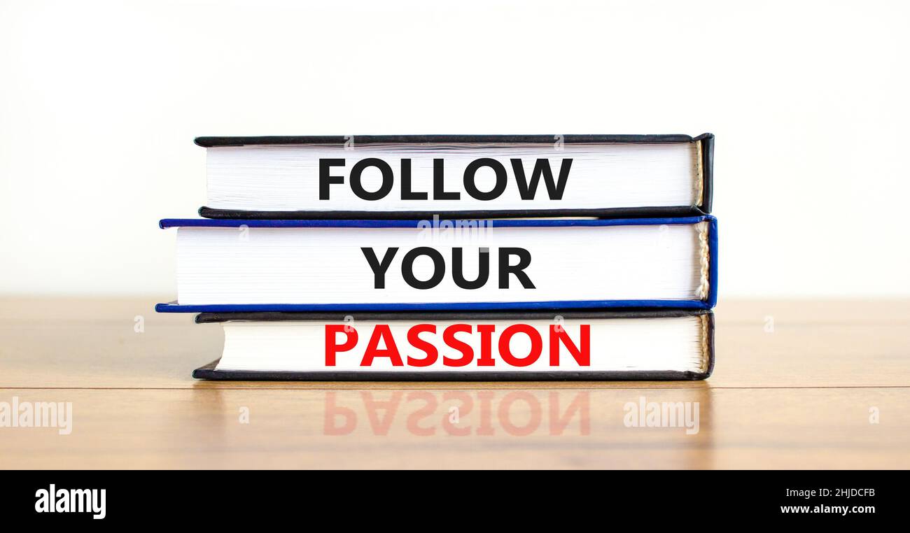 Follow your passion symbol. Concept words Follow your passion on books ...