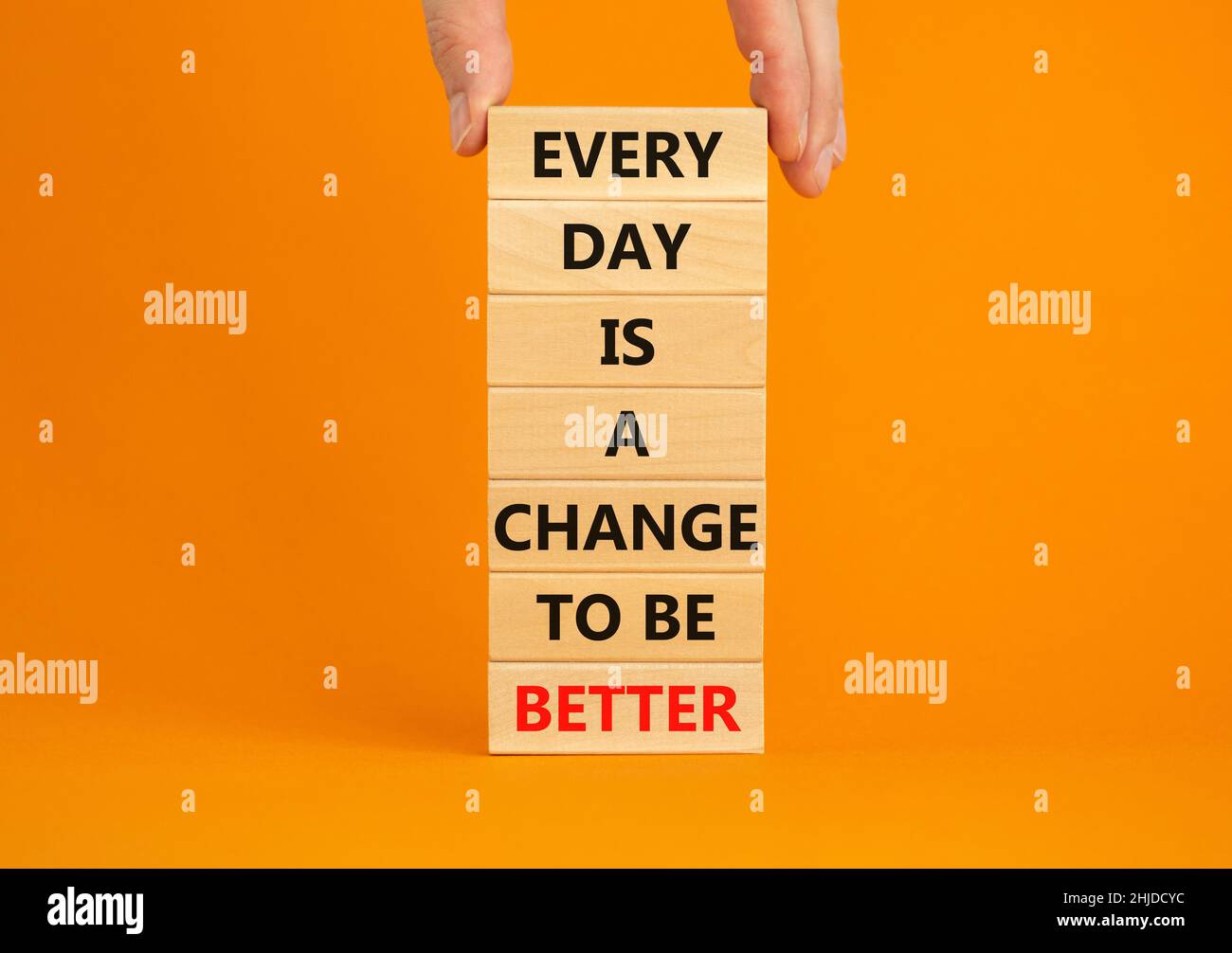 Change to be better symbol. Wooden blocks with words Every day is a ...