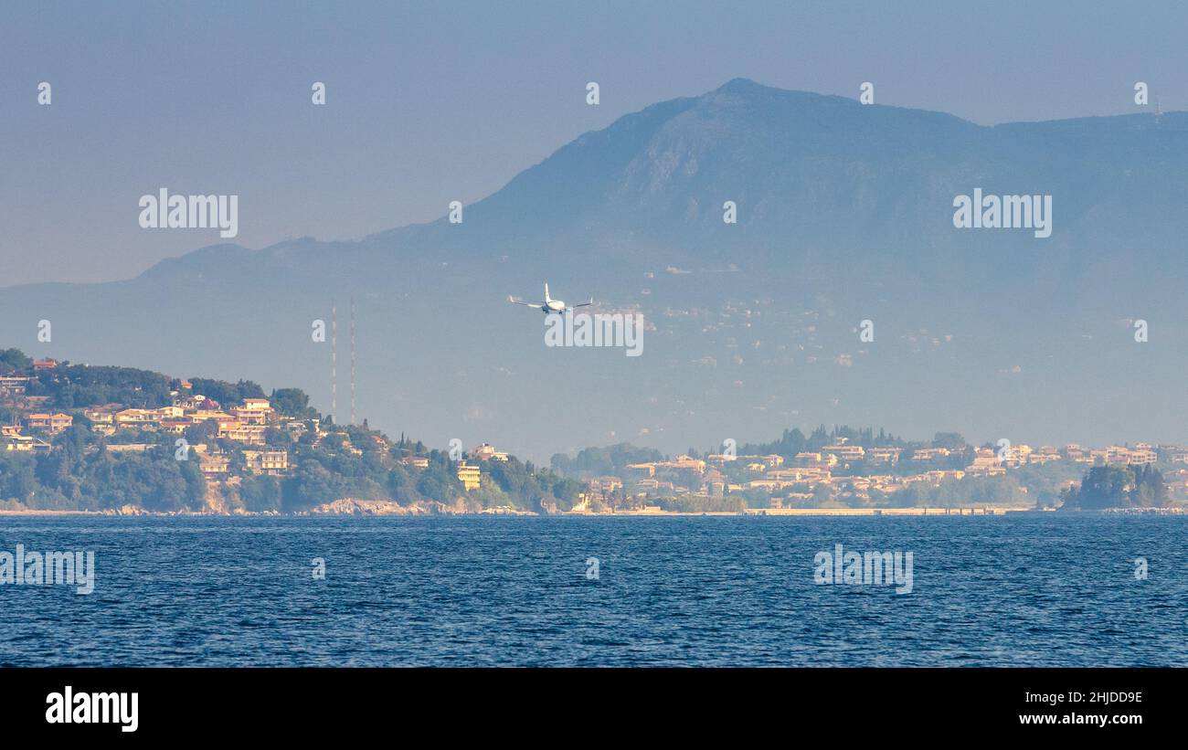 Aircraft landing on the Greek island of Corfu, Europe Stock Photo - Alamy
