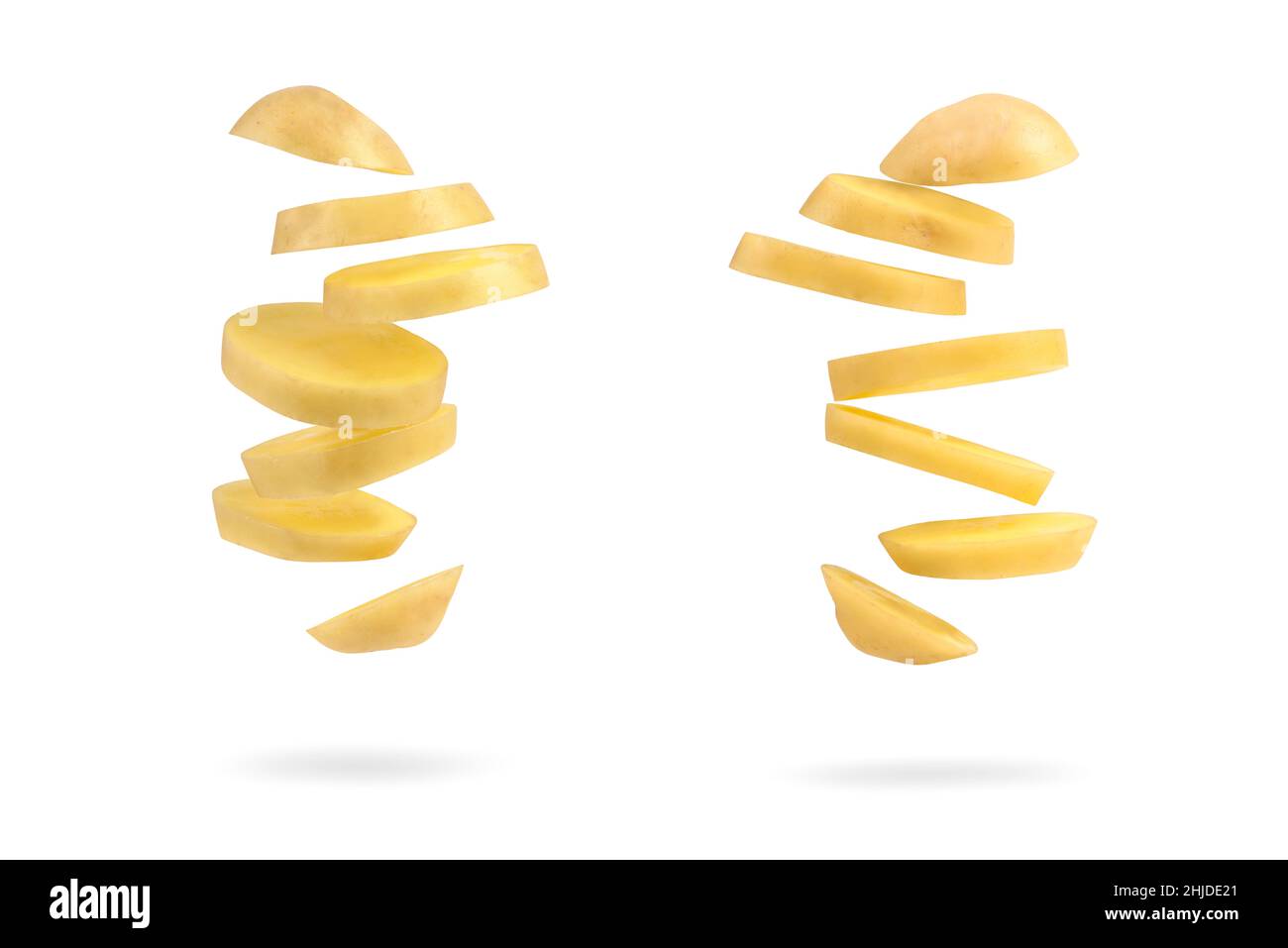 Fresh unpeeled potatoes, isolated on white. Big set flying potatoes on ...