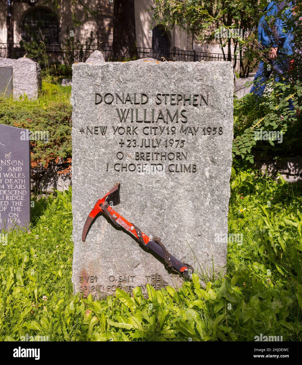 ZERMATT, SWITZERLAND - Memorial headstone with ice ax for climber ...