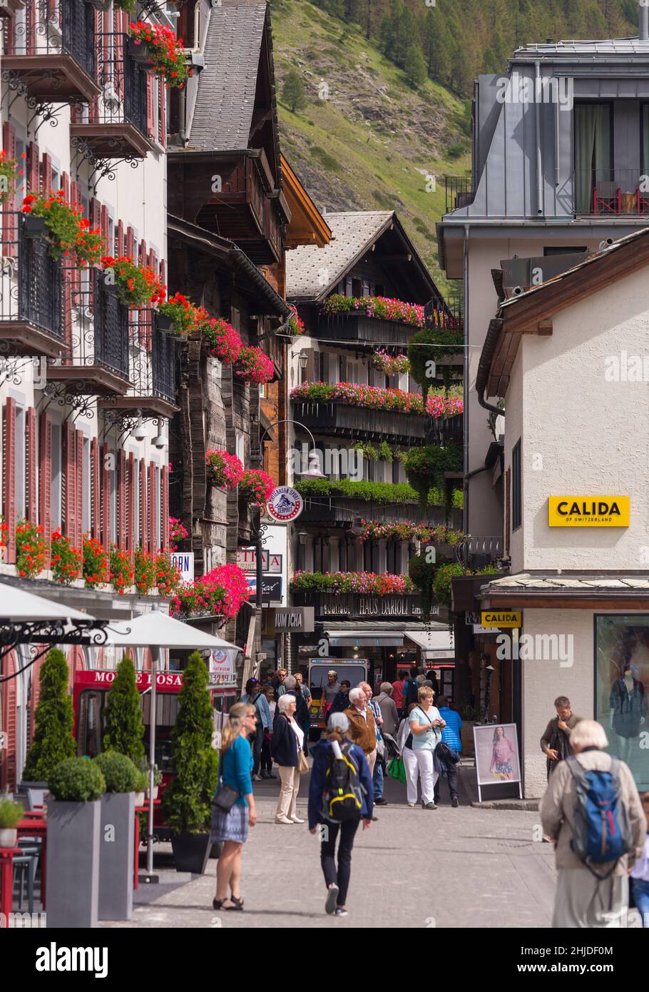 ZERMATT, SWITZERLAND - Tourists and visitors walking on street in ...