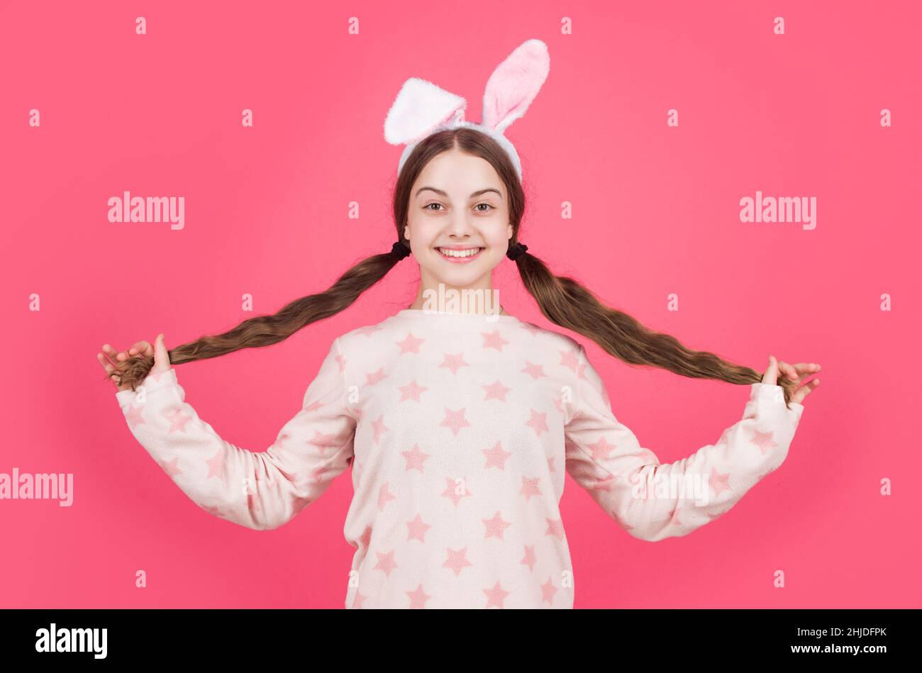 happy easter kid girl in bunny rabbit ears and pajamas, easter Stock ...