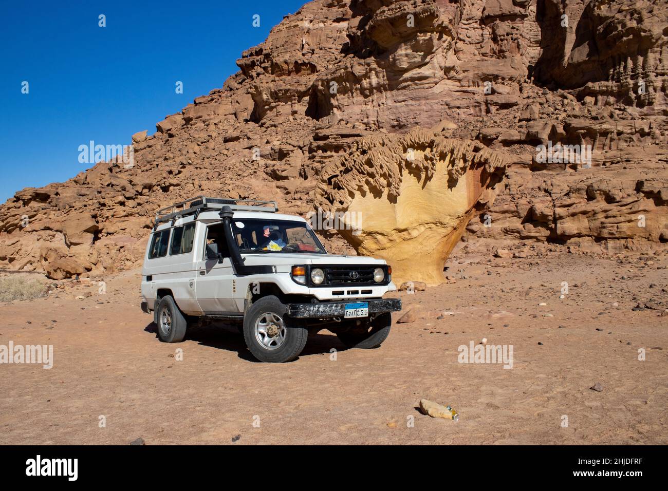A Toyota Landcruiser in front of the Mushroom rock in the Sinai desert ...
