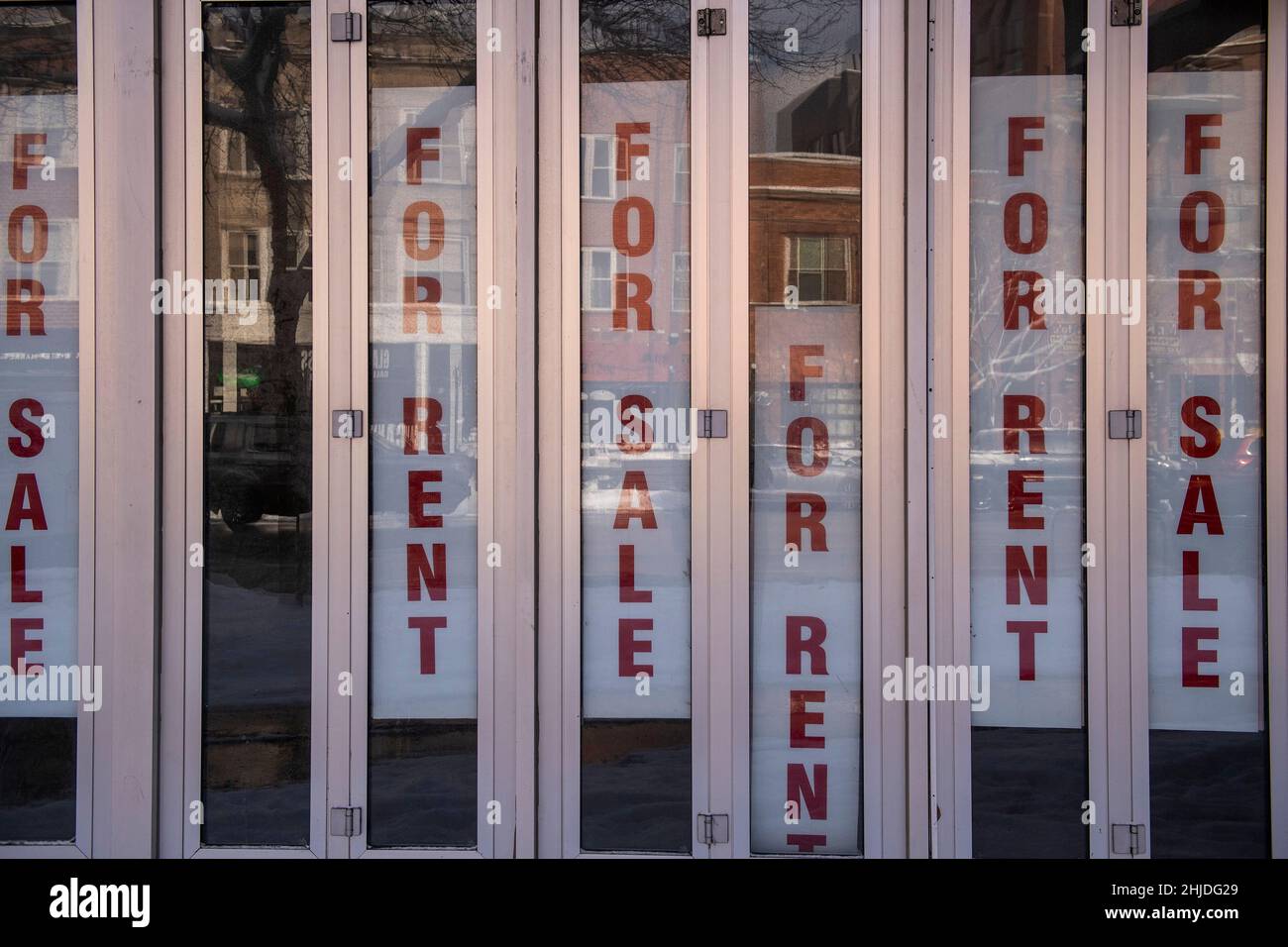For Rent signs fill the windows of a closed storefront on Friday ...