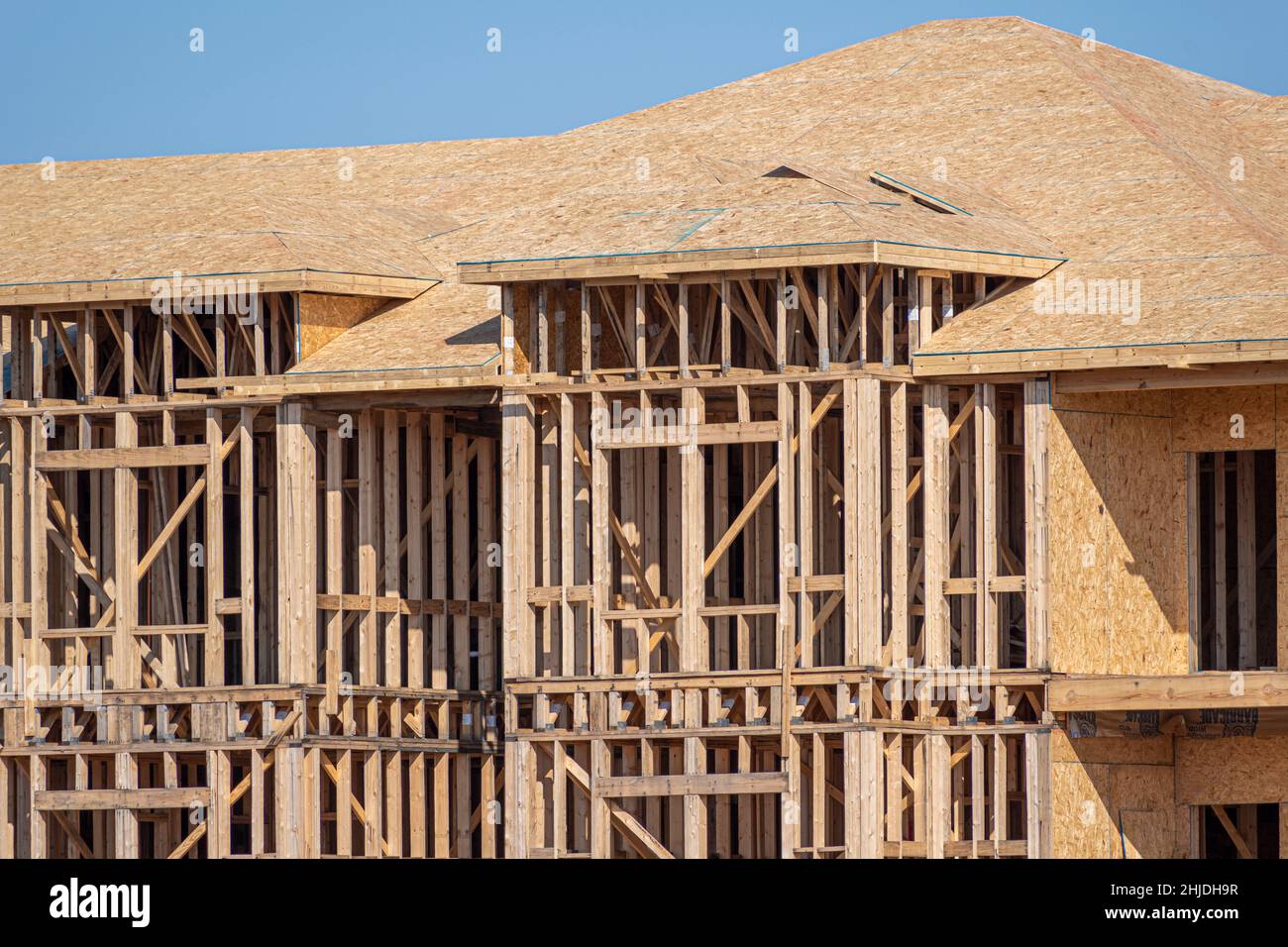Horizontal shot of wooden framing work on a new apartment complex Stock ...