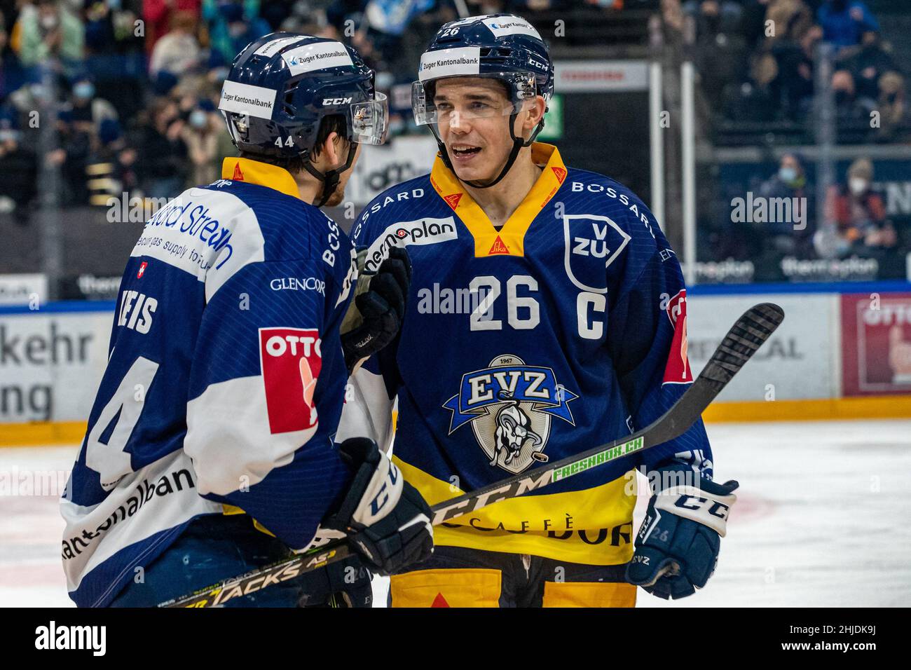 Reto Suri #26 (EV Zug) talks to Samuel Kreis #44 (EV Zug) during the ...