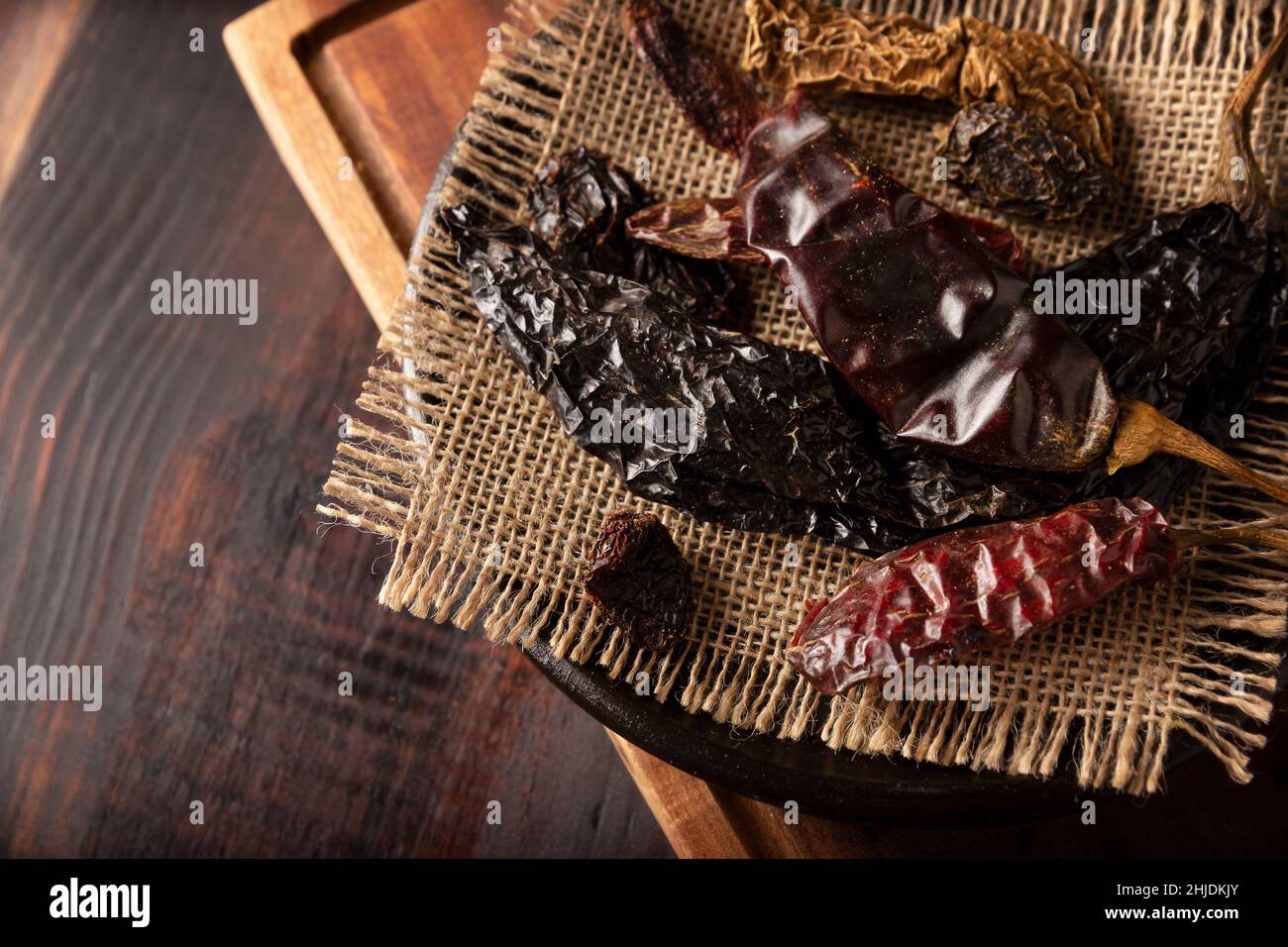 Variety of mexican dried chili. Chile Morita, Guajillo, sChipotle and ...